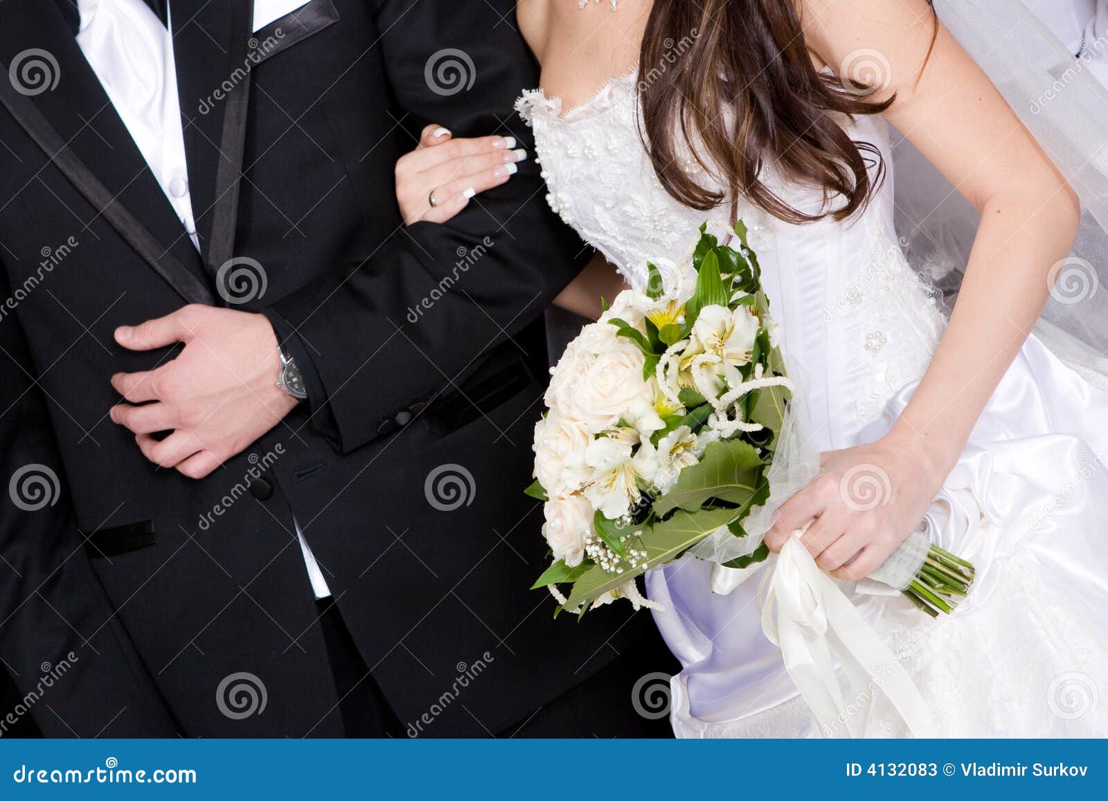 Hands of a Groom and a Bride with a Flower Bouquet Stock Image - Image ...