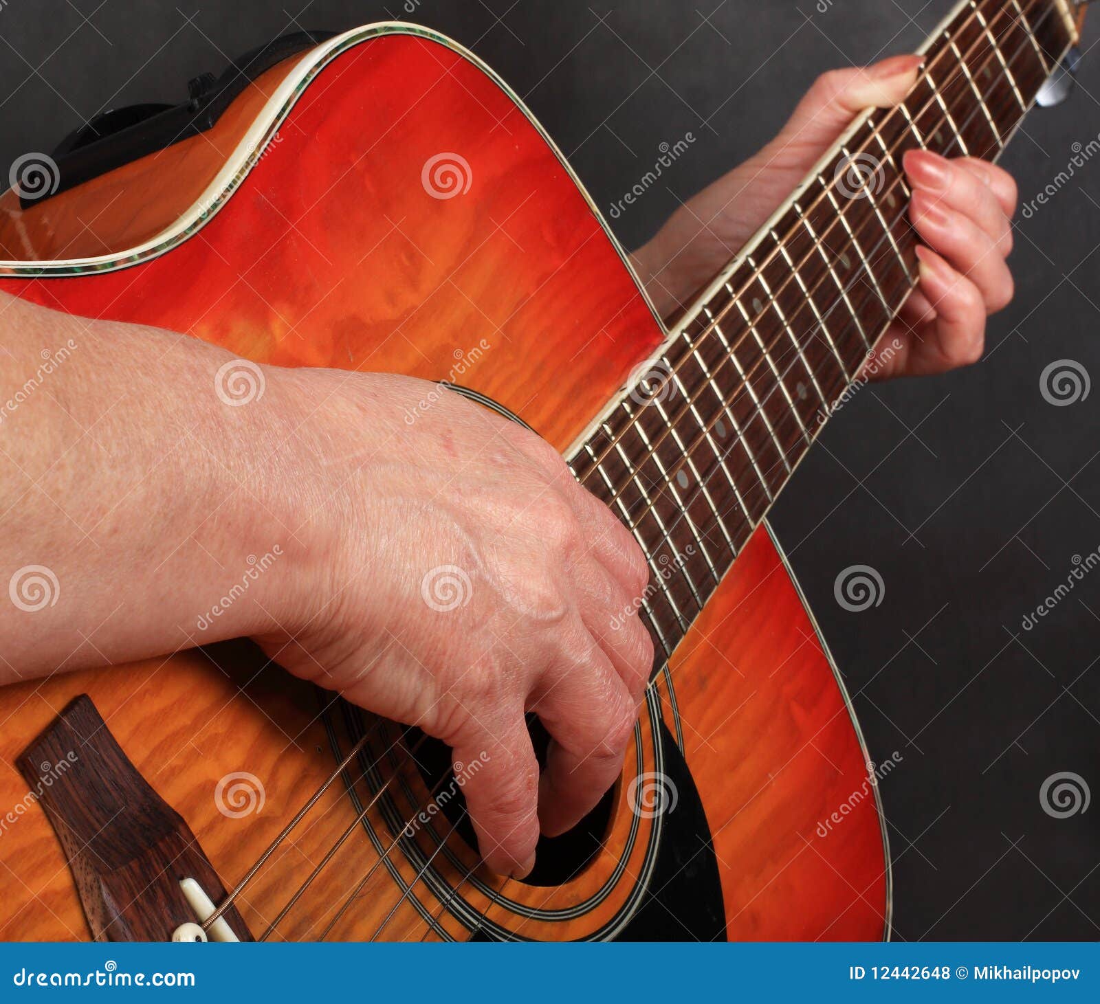 Hands on a guitar stock photo. Image of female, hands - 12442648