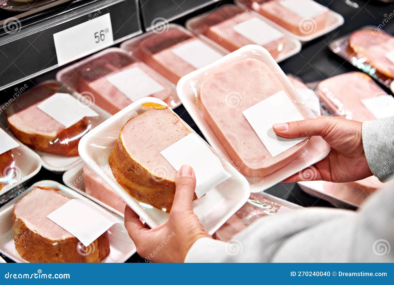 Hands with ham at store stock photo. Image of food, hand - 270240040