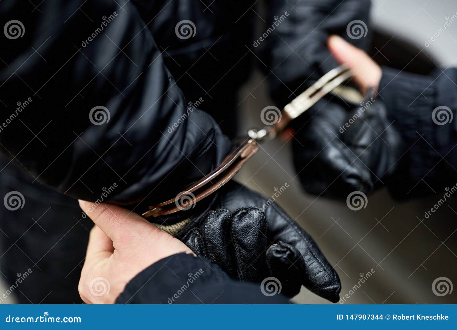 Hands Handcuffed Behind Back Stock Photo - Image of arrest, handcuffs ...