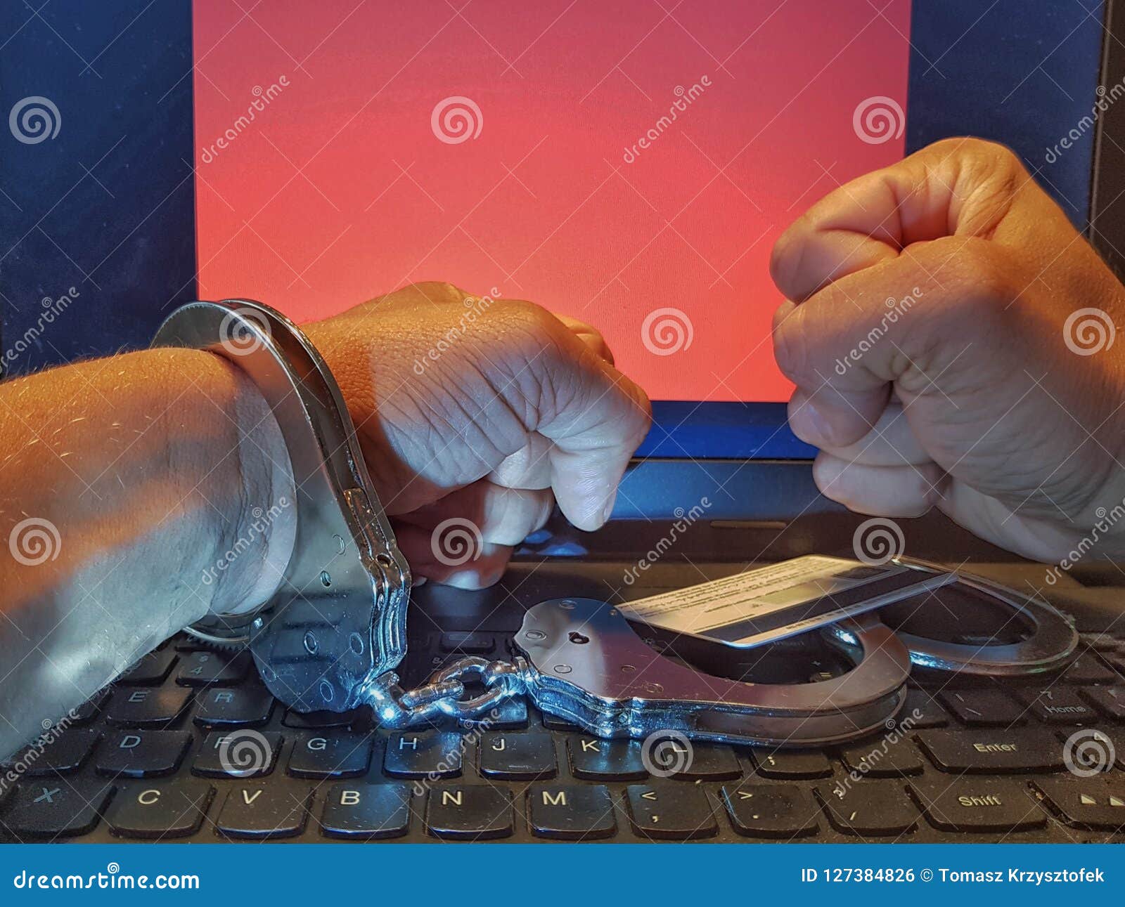 Hands and handcuffs stock photo. Image of laptop, cyber - 127384826