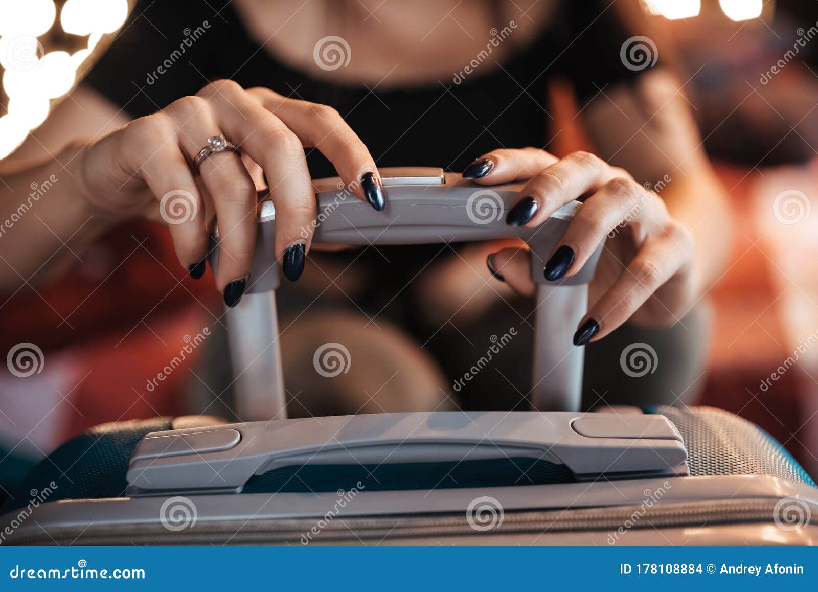 We Hold the Handle of the Suitcase with Our Hands Stock Photo - Image ...