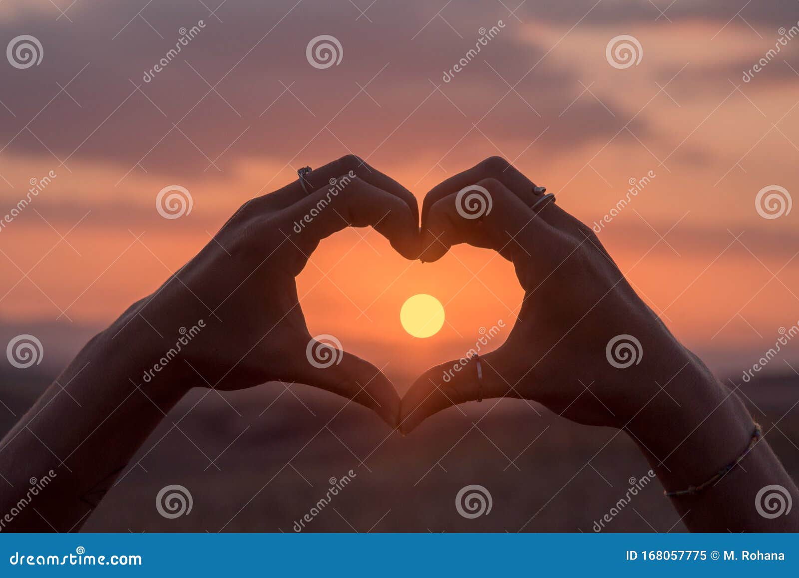 Hands heart at sunset stock image. Image of valentines - 168057775