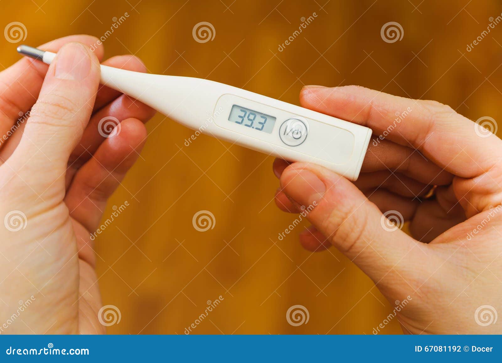 Hands Hold Thermometer with High Temperature on a Screen Stock Photo ...
