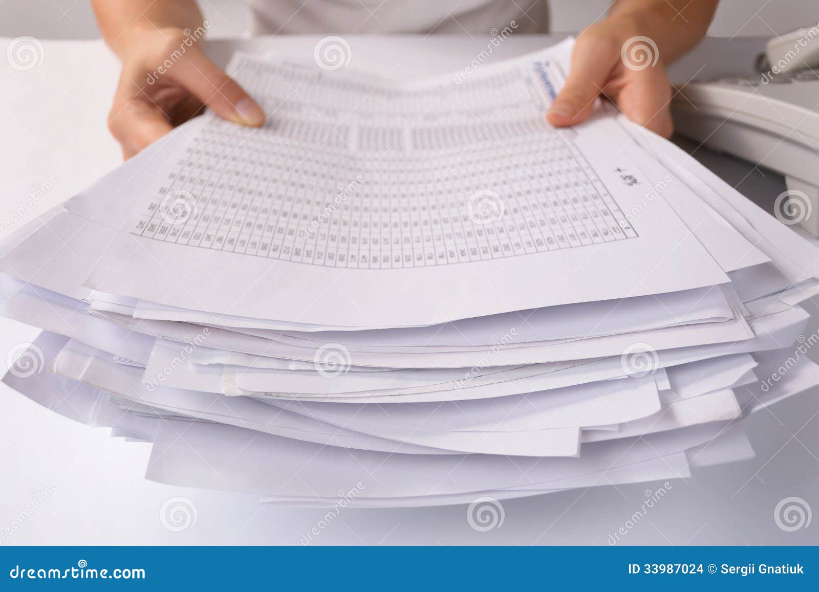 Hands Holding a Batch of Loose Paperwork Stock Photo - Image of school ...