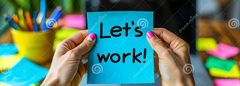 Hands Holding a Blue Sticky Note with the Phrase Lets Work! Amidst a ...