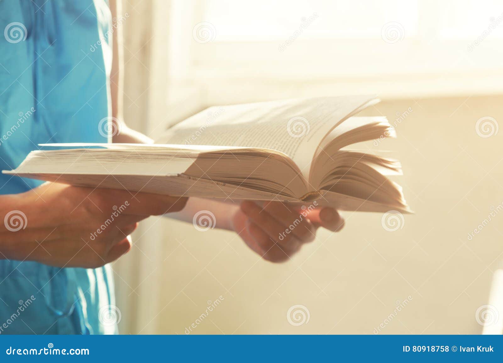 Hands holding book stock photo. Image of reading, volume - 80918758