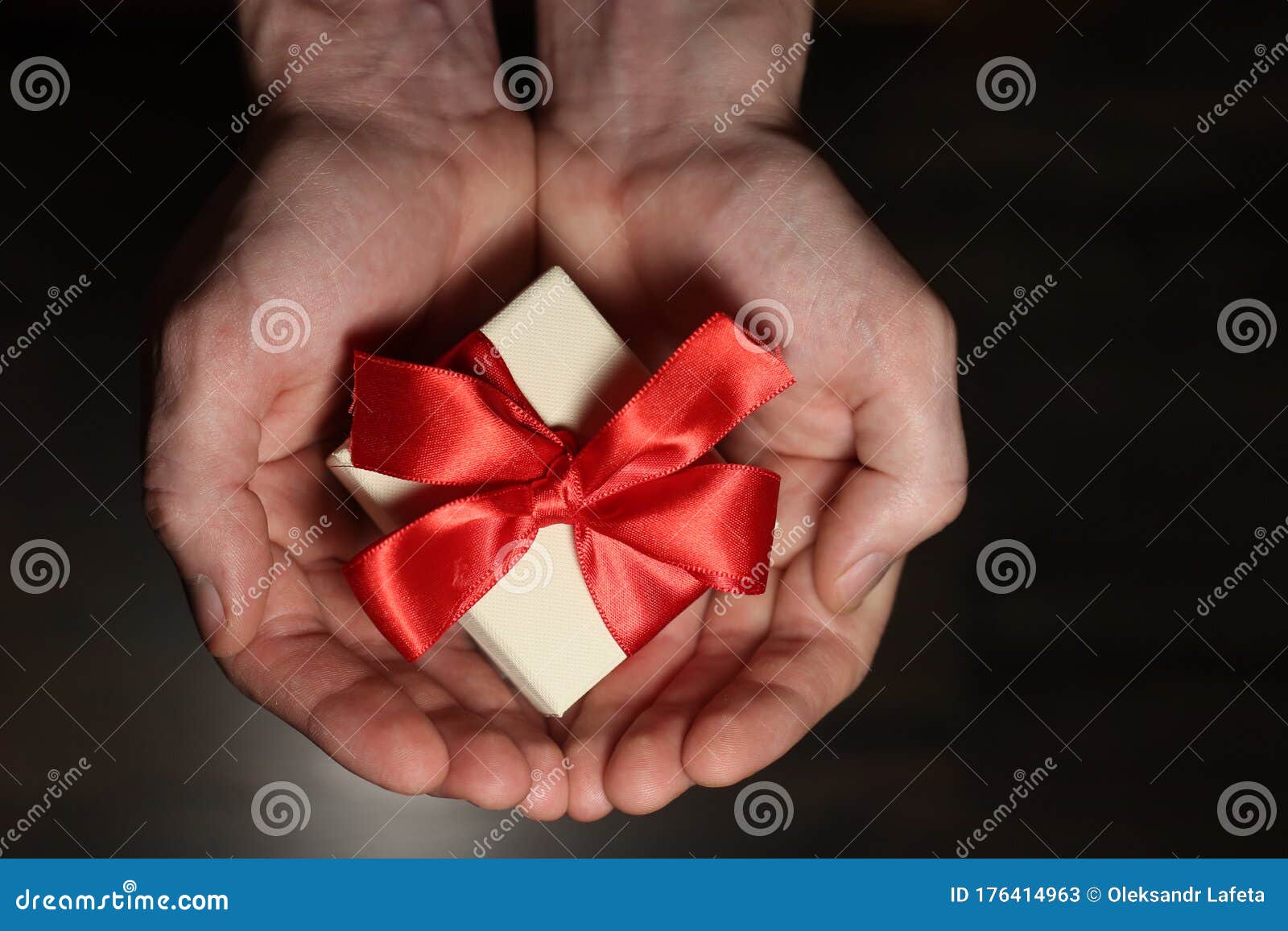 Hands holding a box. stock image. Image of hand, body - 176414963
