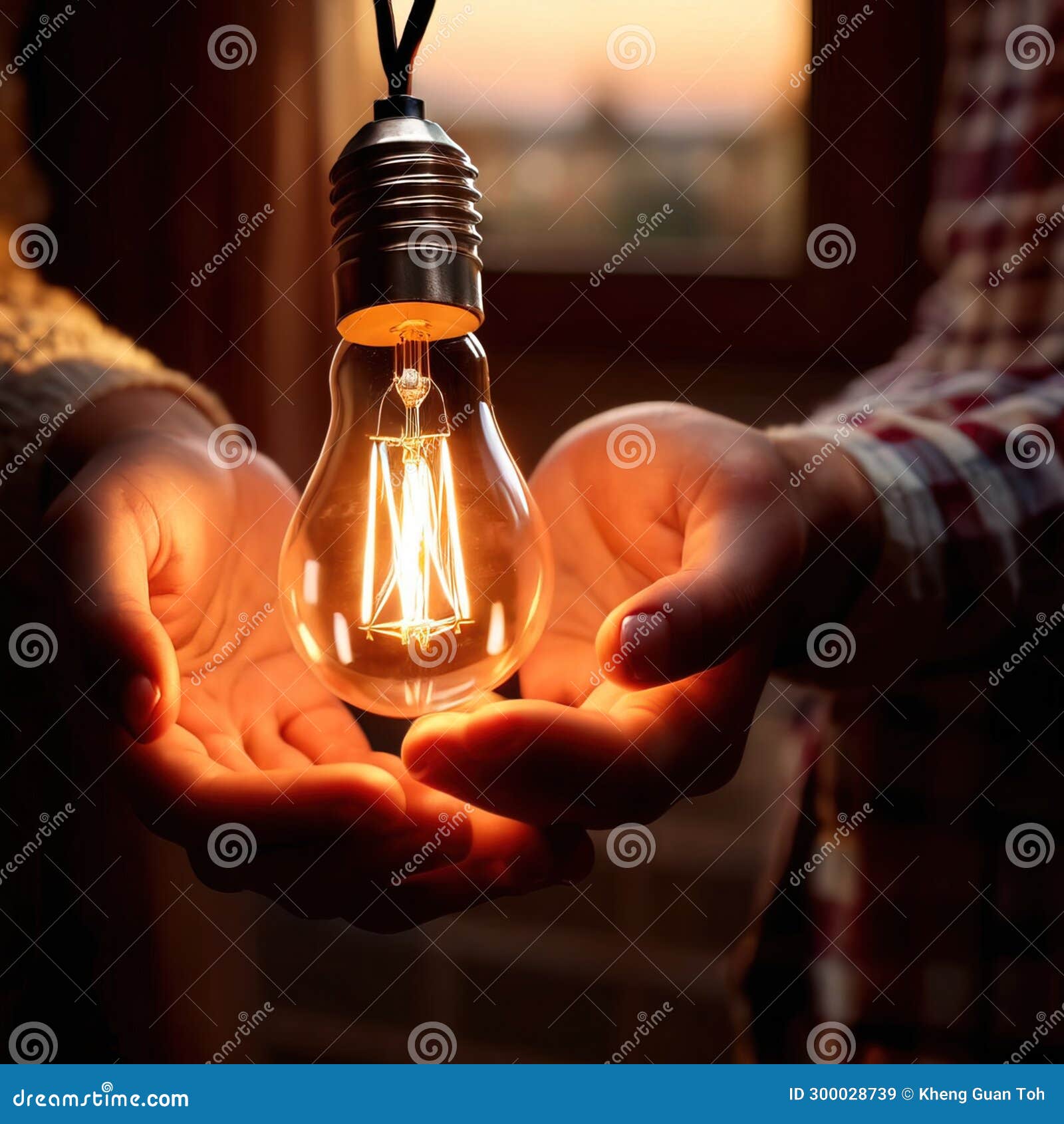 Hands Holding Bright Glowing Lightbulb, a Metaphor for Grapsing ...