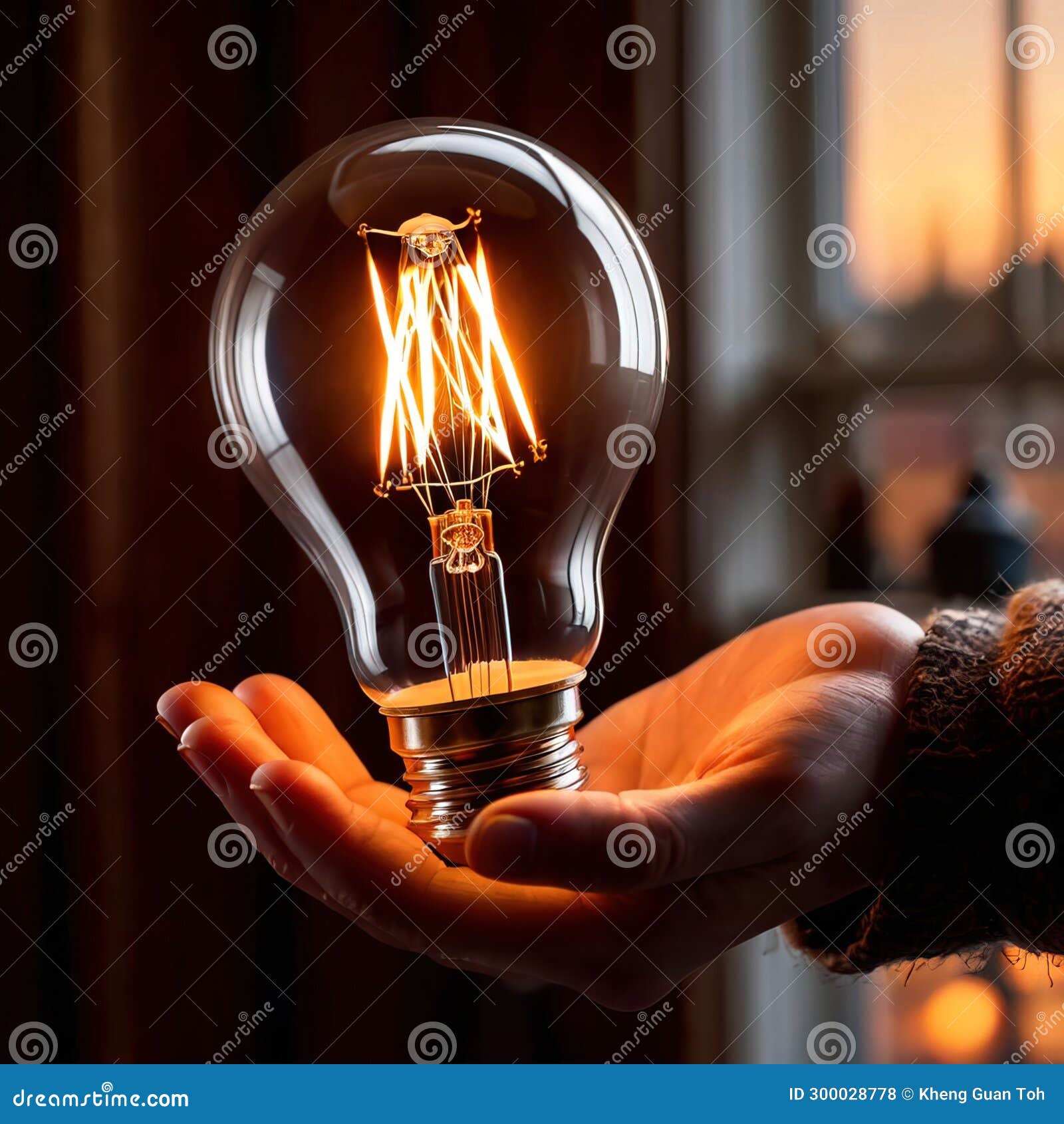 Hands Holding Bright Glowing Lightbulb, a Metaphor for Grapsing ...