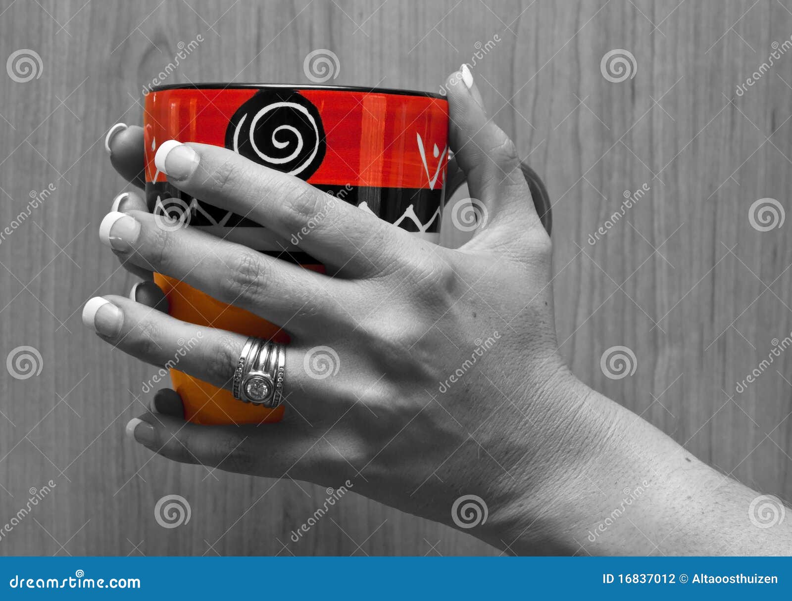 Hands Holding a Bright Red Cup Stock Photo - Image of monochrome, human ...