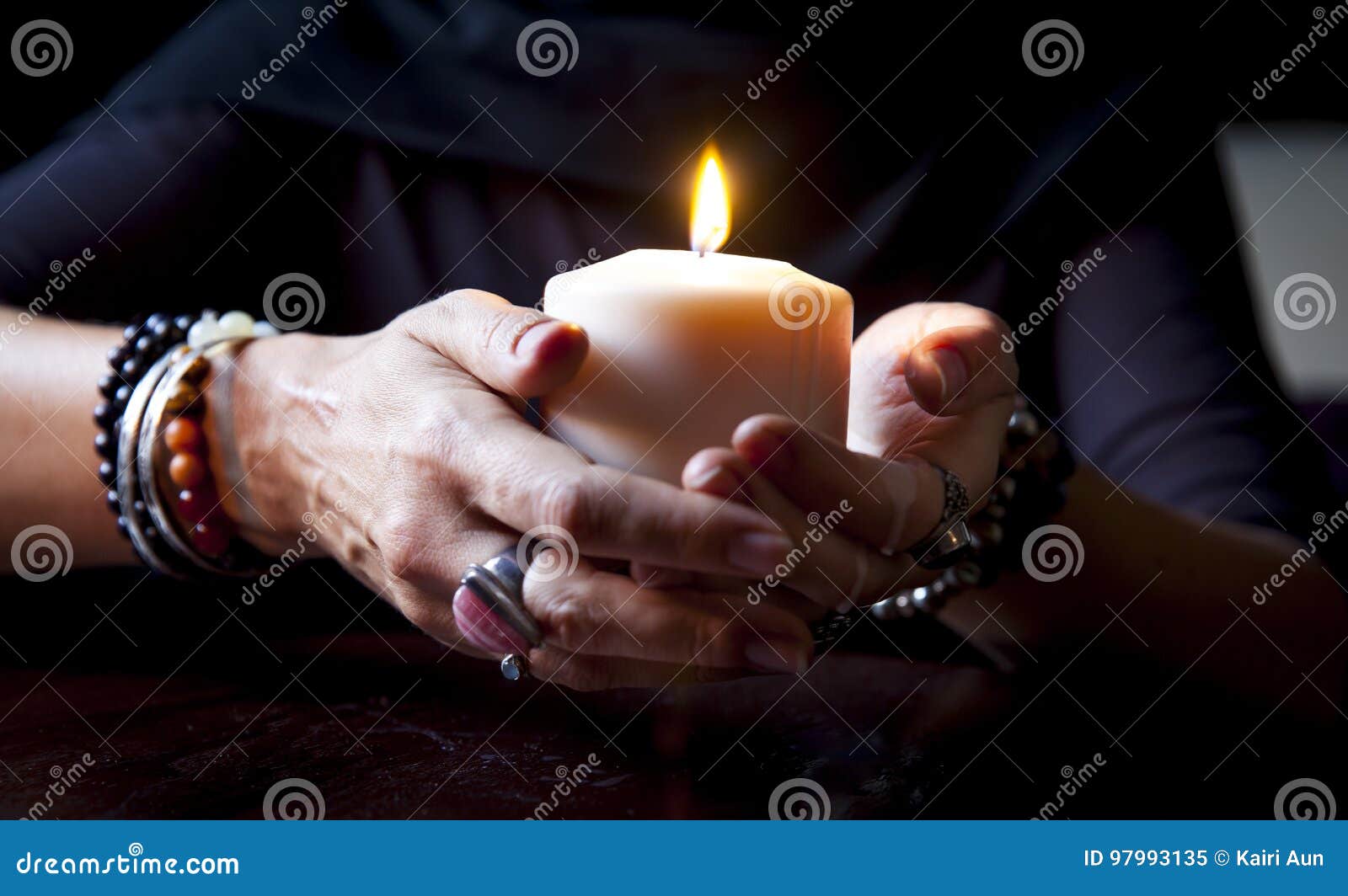 Hands holding a candle stock image. Image of romantic - 97993135