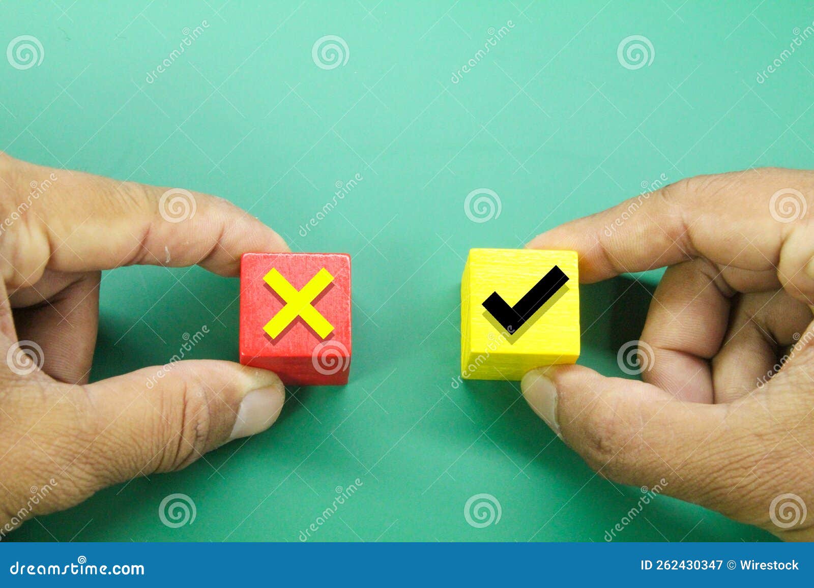 Hands Holding Colored Cubes with Wrong and Correct Icons. the Concept ...
