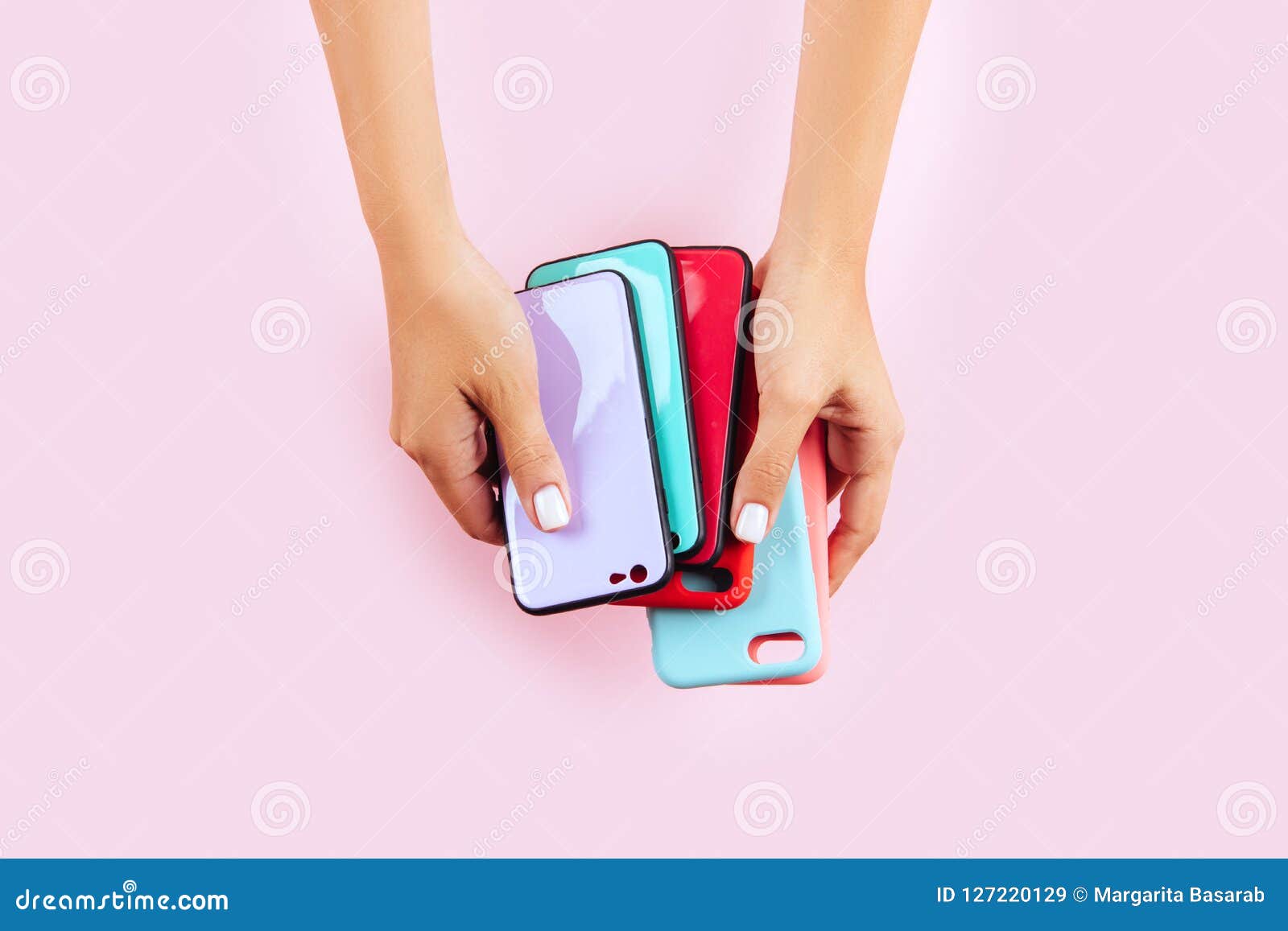 Hands Holding Colorful Smartphone Cases Stock Image - Image of media ...