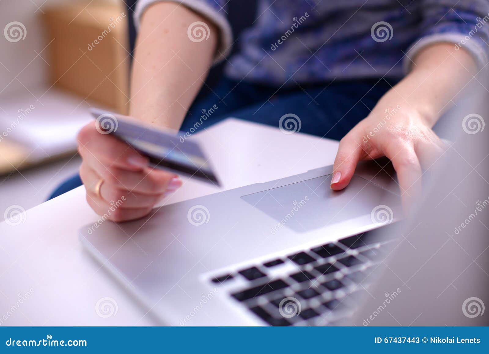 Hands Holding a Credit Card and Using Laptop Computer for Online ...