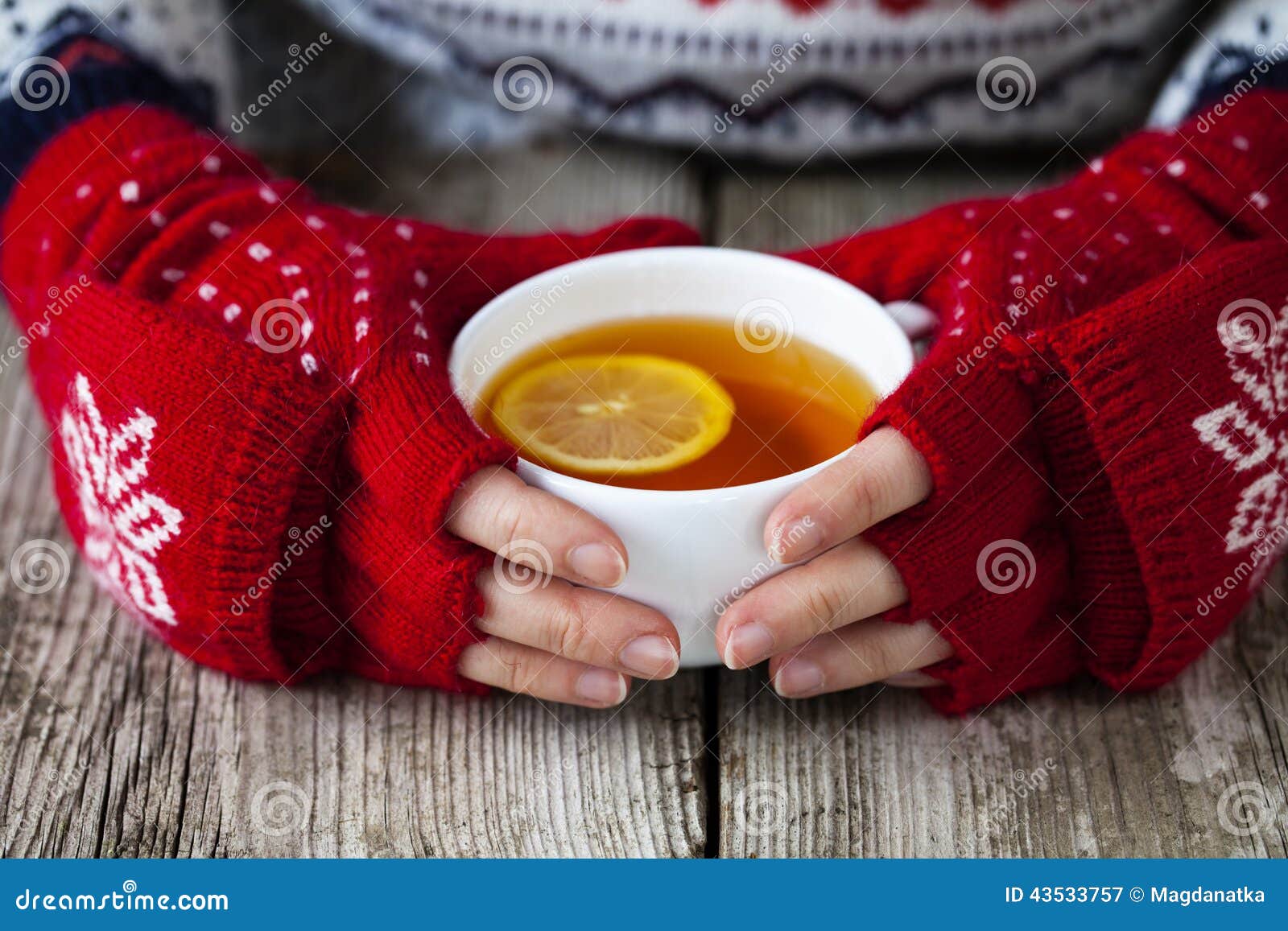 Hands holding a cup of tea stock image. Image of hold - 43533757