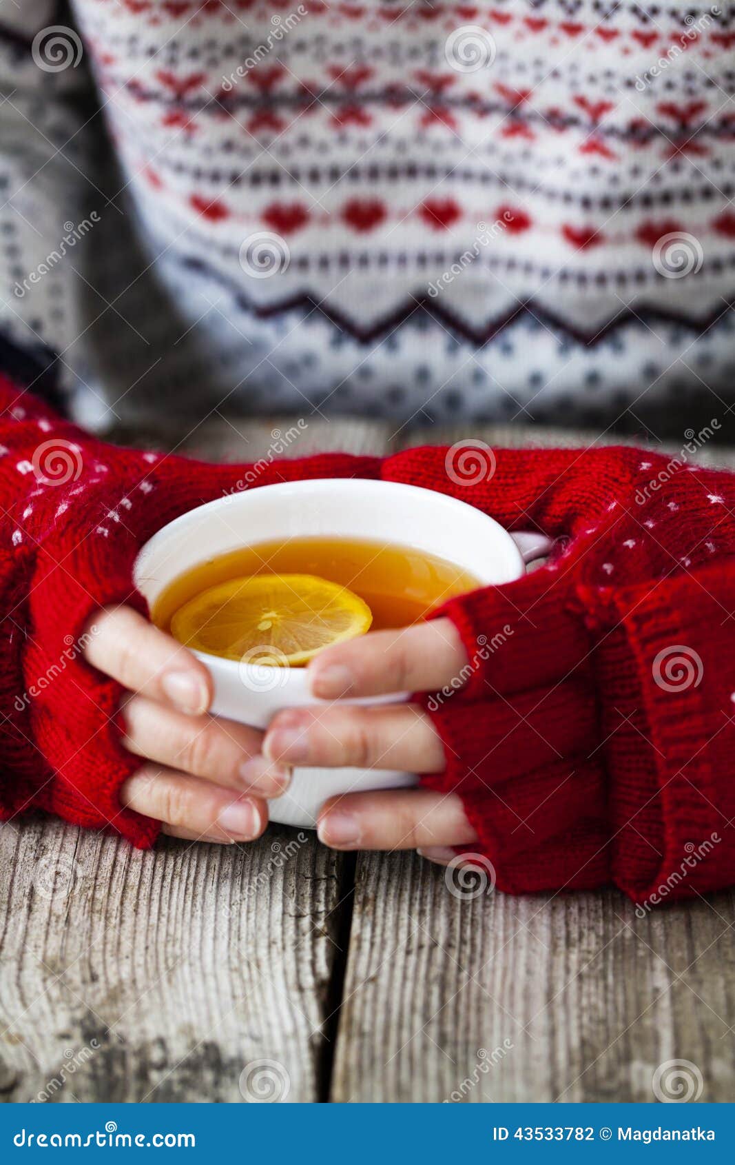 Hands holding a cup of tea stock photo. Image of holiday - 43533782