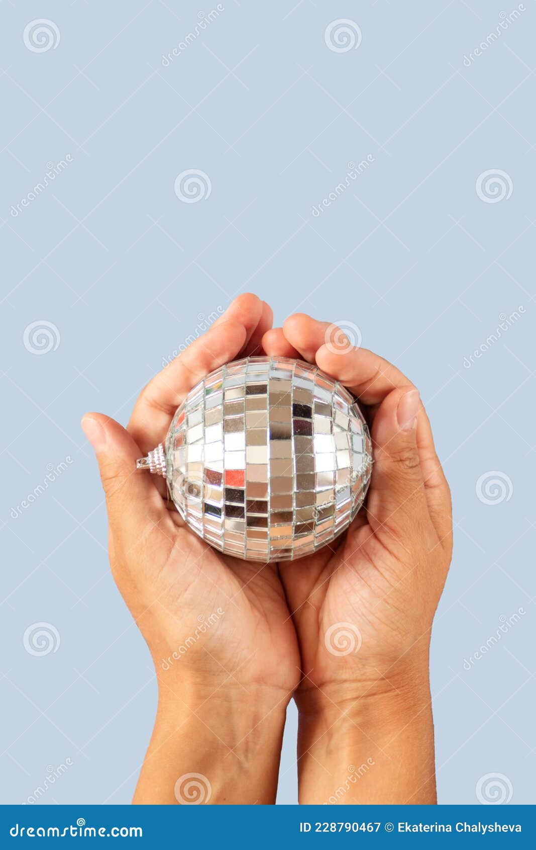 Hands Holding Disco Ball on Blue Background Stock Image - Image of ...
