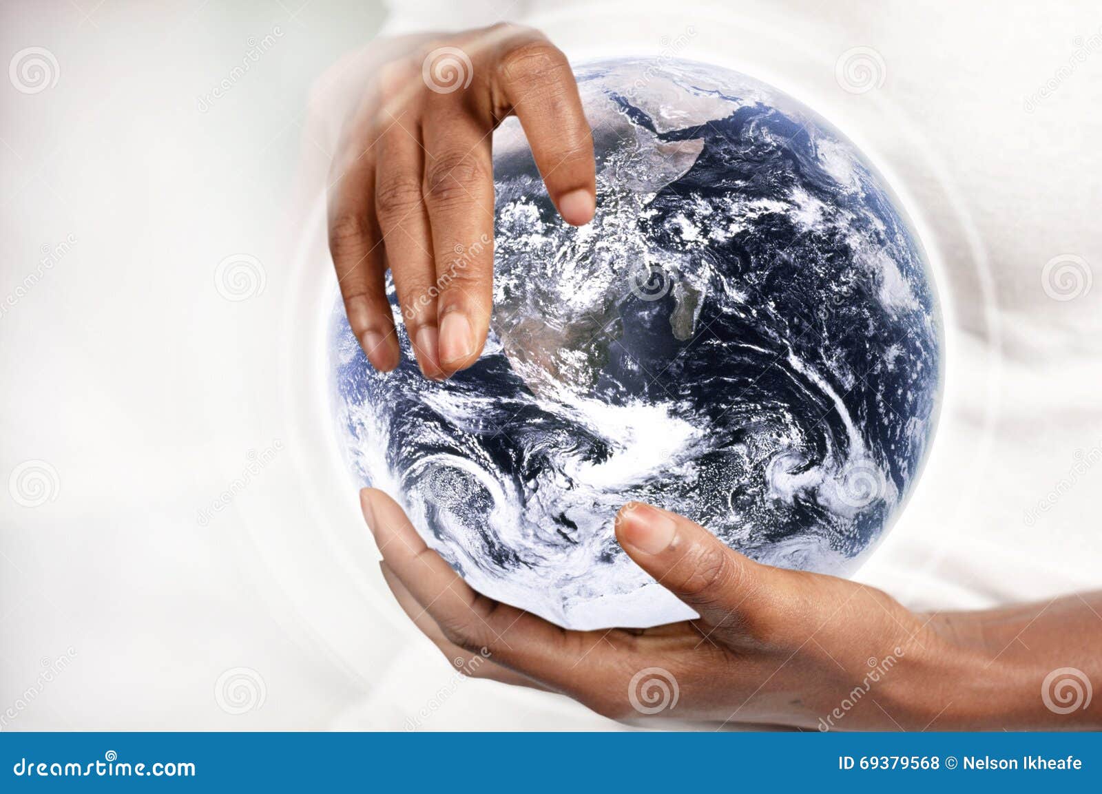 Hands holding earth stock photo. Image of care, earth - 69379568