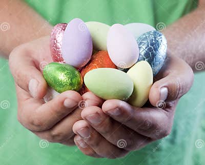 Hands holding Easter Eggs stock photo. Image of white - 13256994