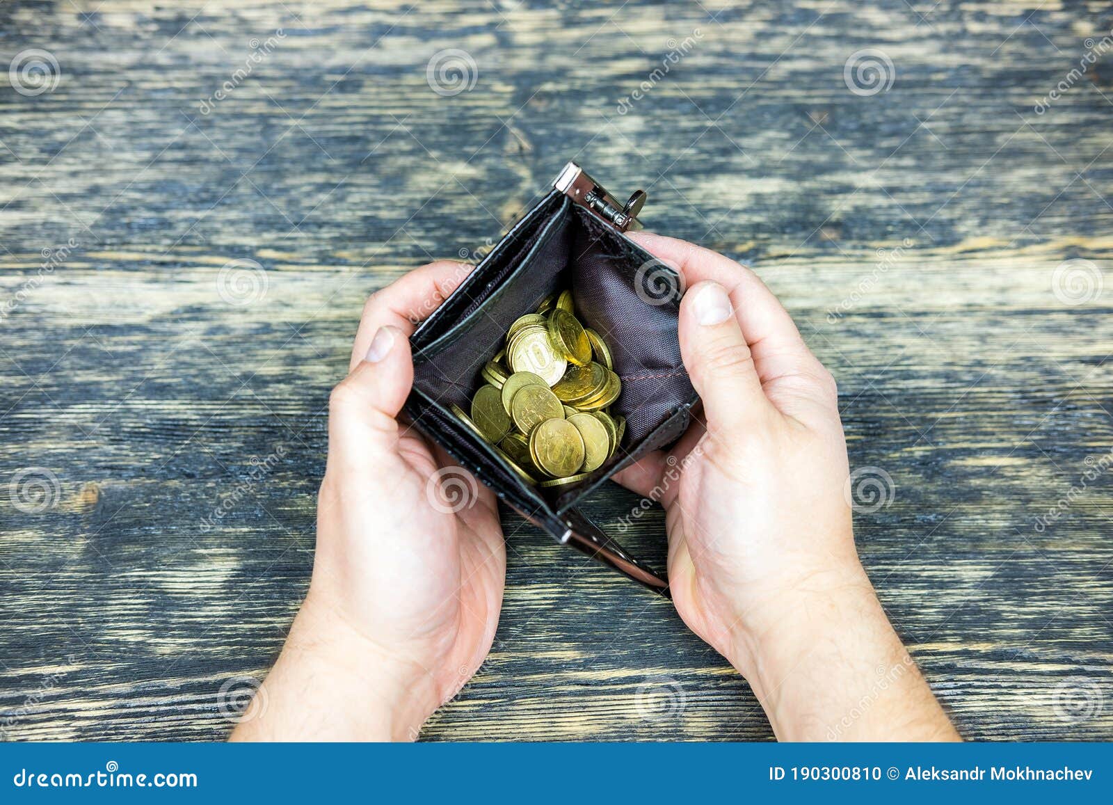 Hands Holding an Empty Wallet with Coins Stock Photo - Image of ...