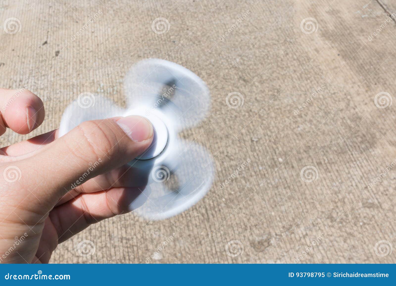 Hands Holding Fidget Spinner Stock Image - Image of game, fidget: 93798795