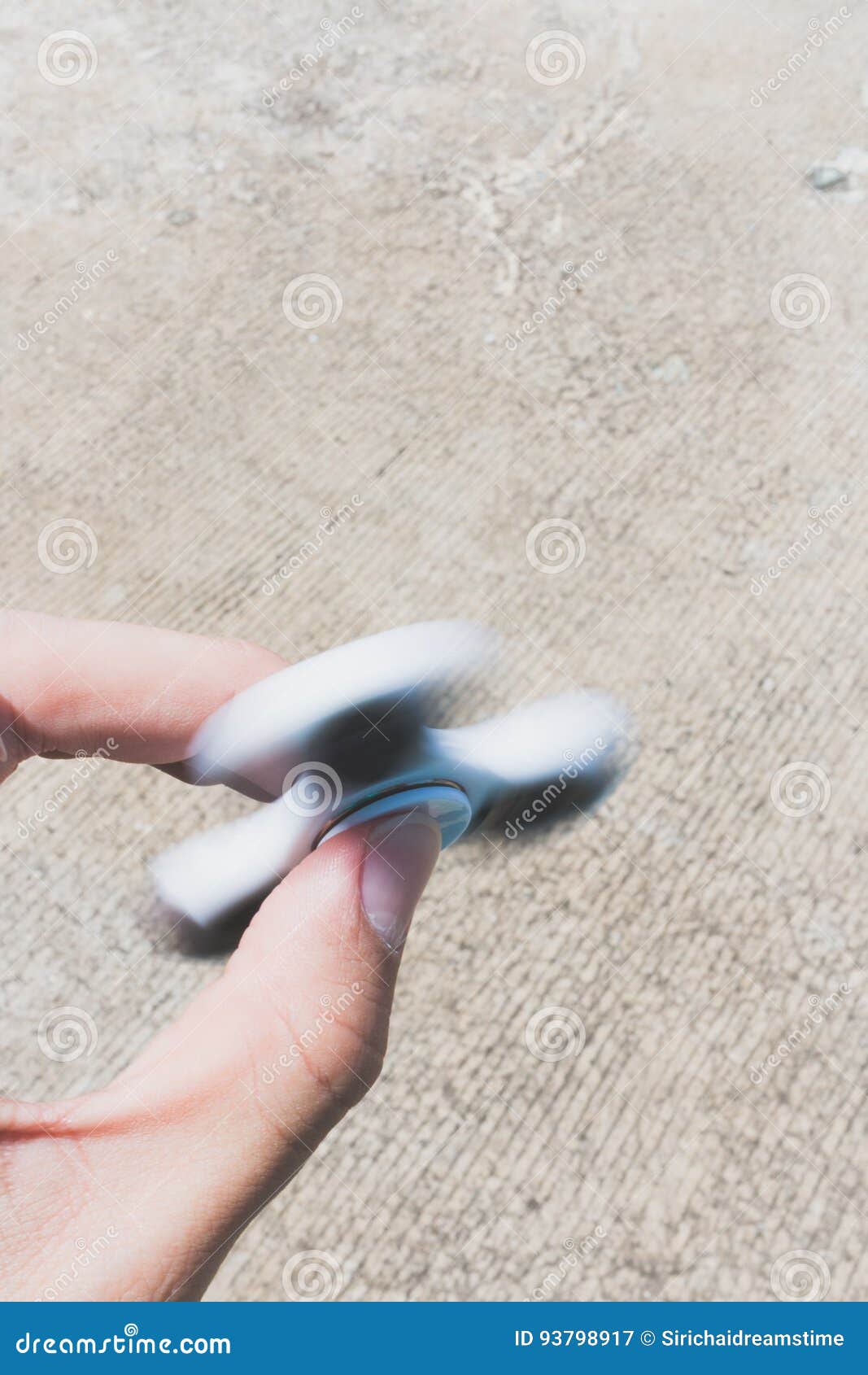 Hands Holding Fidget Spinner Stock Image - Image of trend, play: 93798917