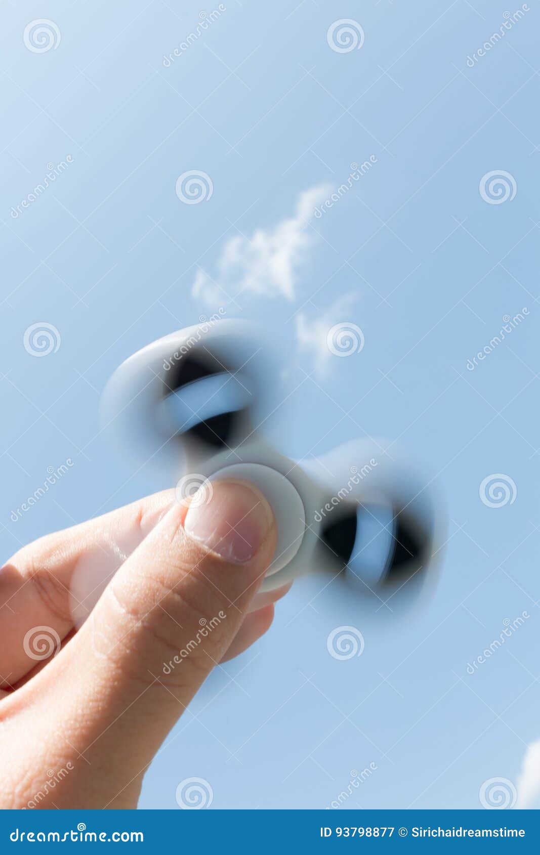 Hands Holding Fidget Spinner Stock Image - Image of rotating, object ...