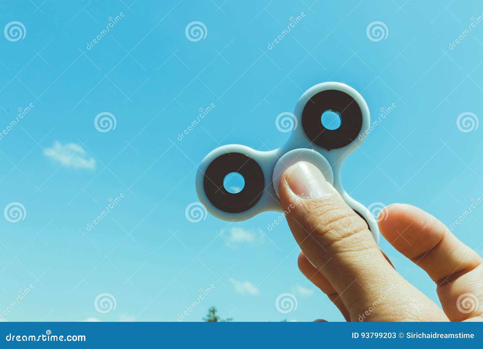 Hands Holding Fidget Spinner Stock Image - Image of kids, fidget: 93799203