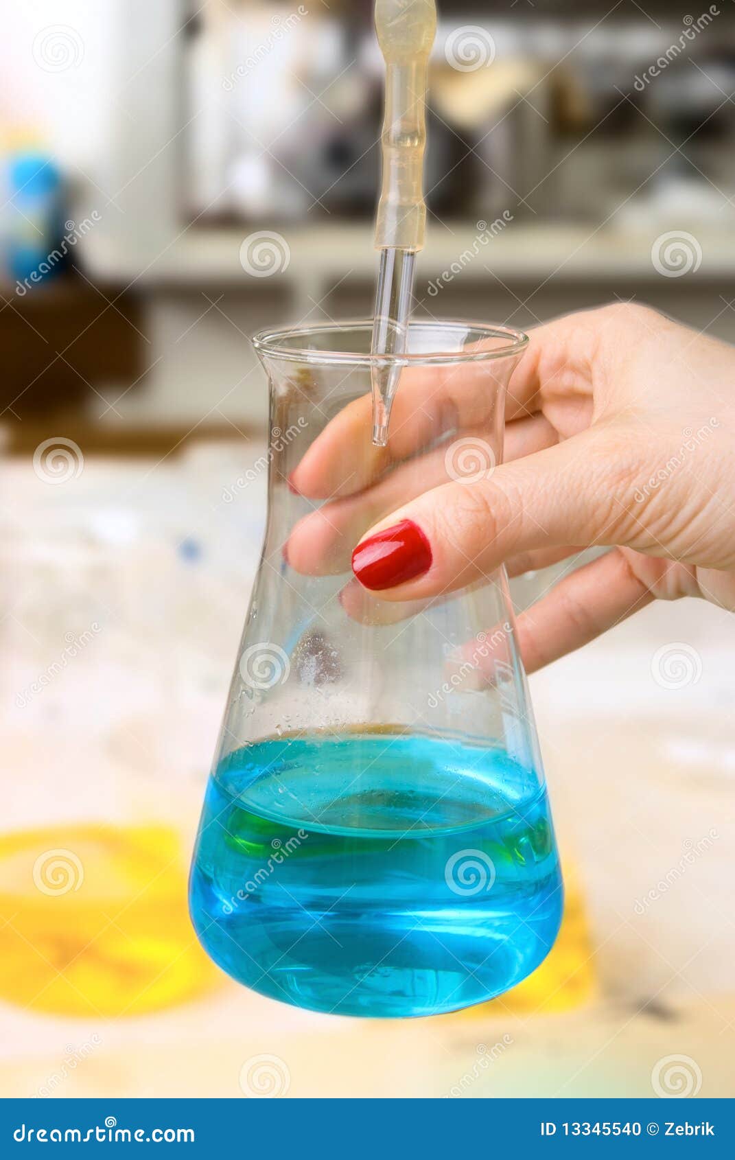 Hands holding a flask stock photo. Image of biochemist - 13345540