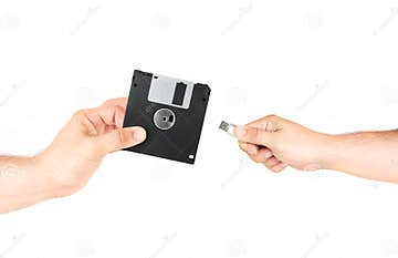 Hands Holding Floppy Disk Versus Flash Memory Stick Stock Photo - Image ...