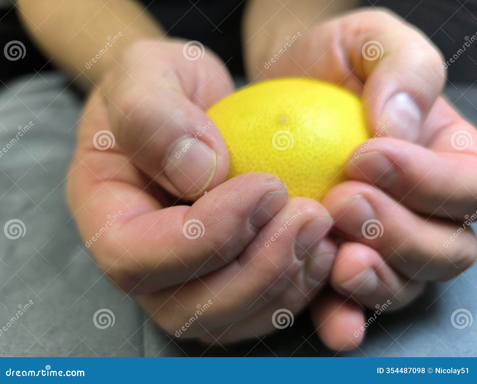 Hands Holding a Fresh Lemon Stock Photo - Image of holding, nourishment ...