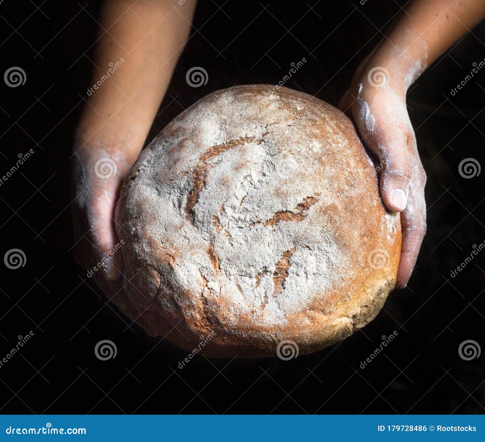 Hands Holding Fresh Round Bread Stock Photo - Image of homemade ...