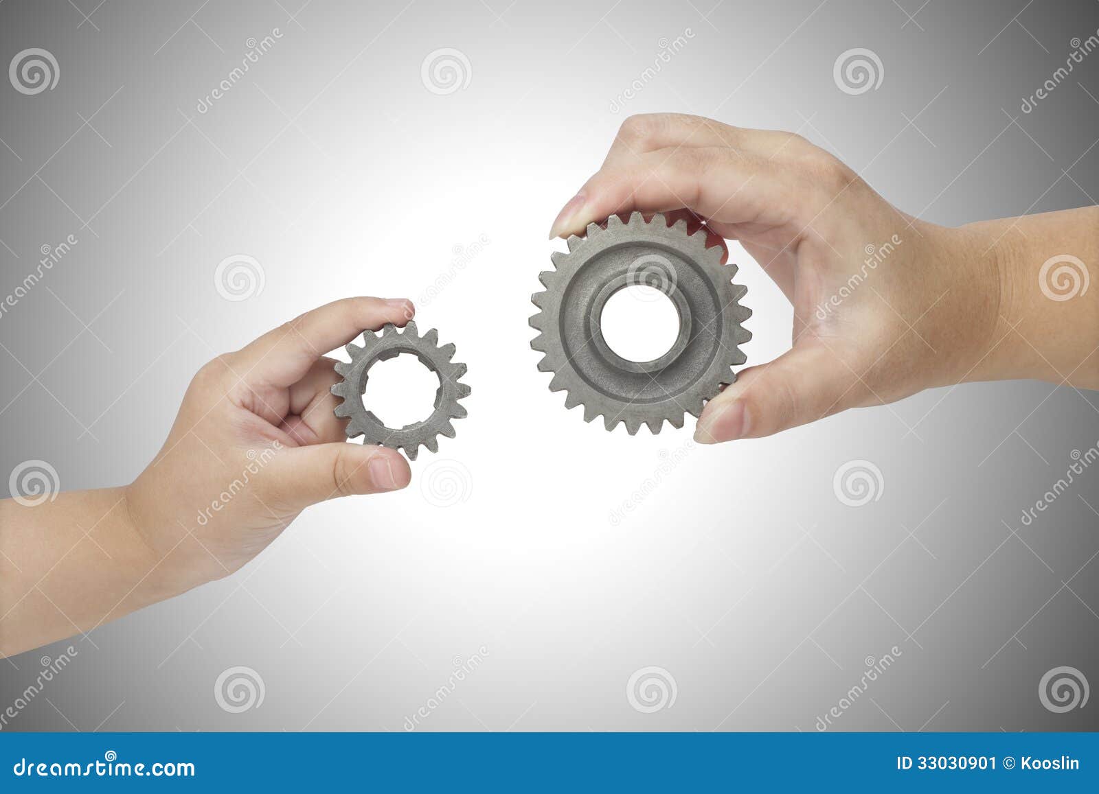 Hands holding gear stock image. Image of circle, steel - 33030901