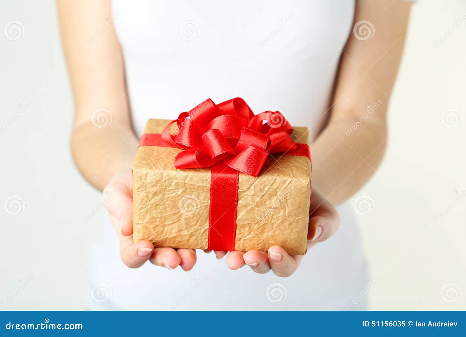 Hands holding gift box stock image. Image of brown, love - 51156035