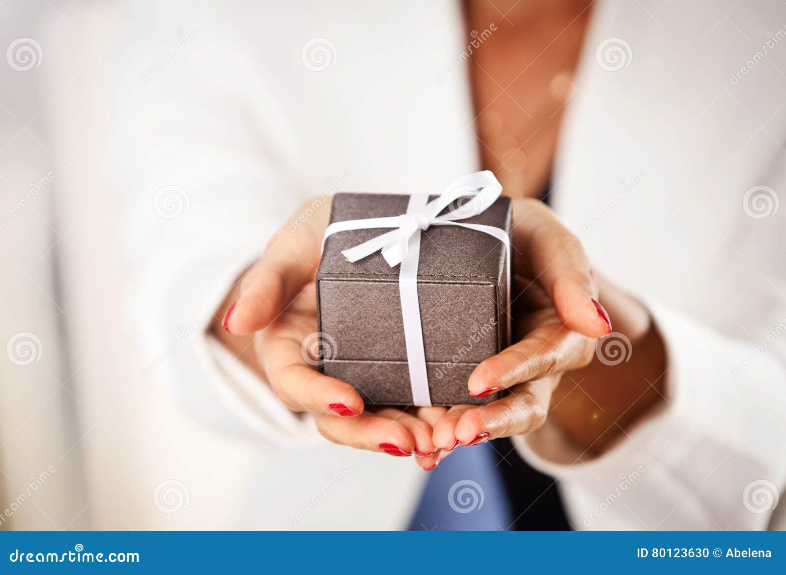 Hands holding gift box stock photo. Image of holding - 80123630