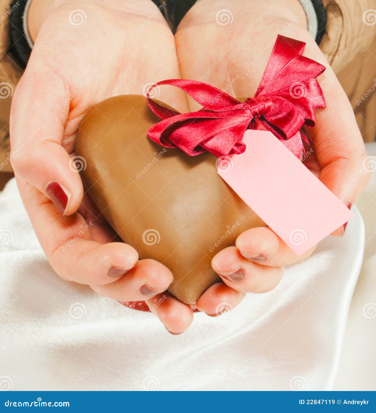 Hands Holding a Heart Shaped Chocolate Stock Image - Image of sweets ...