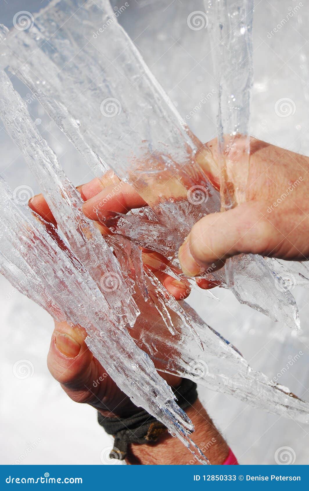 Hands Holding Ice stock image. Image of clear, thumbs - 12850333
