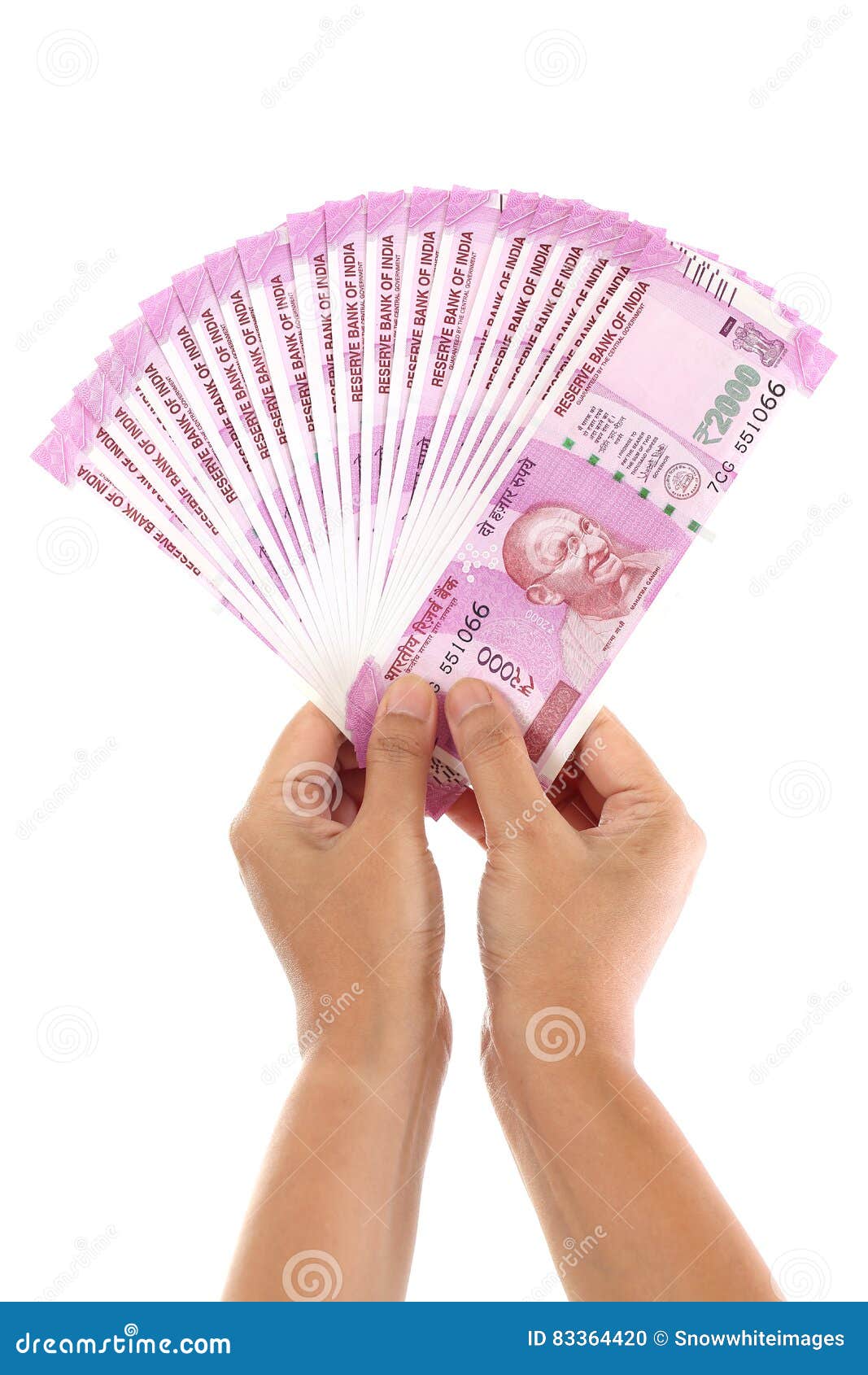 Hands Holding Indian 2000 Rupee Notes Against White Stock Photo - Image ...