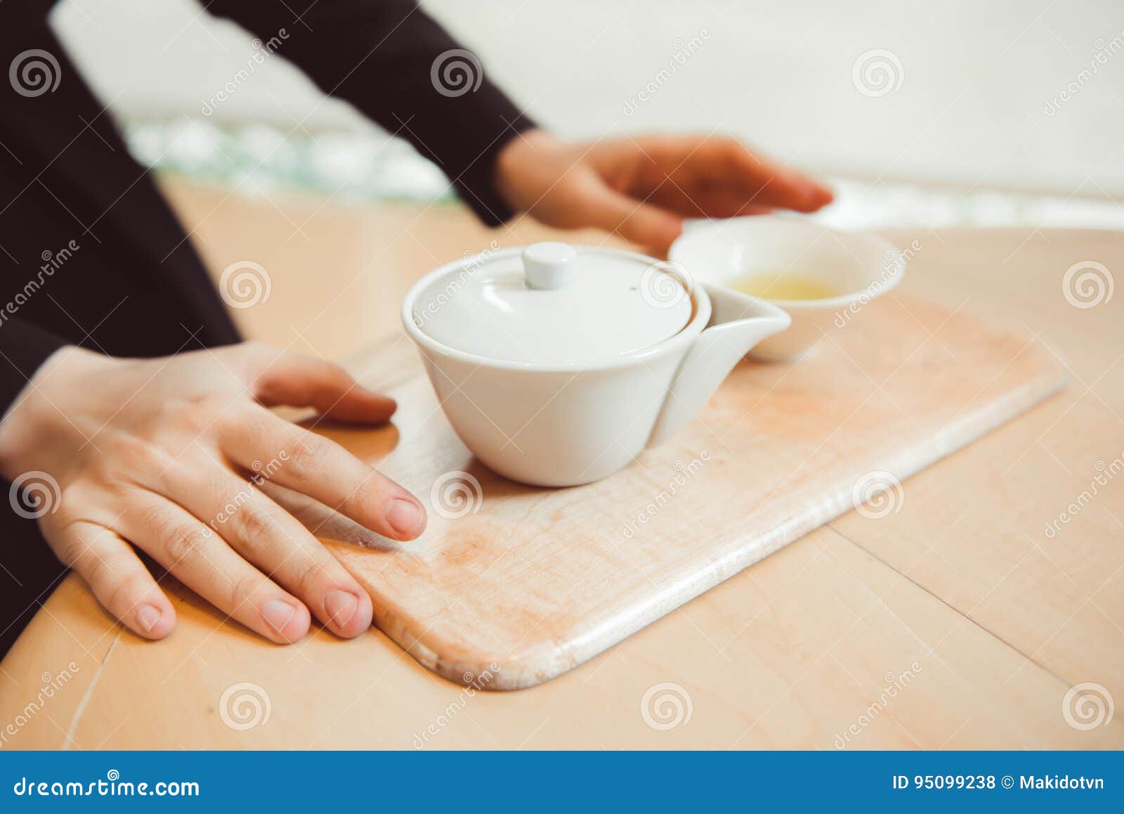 Hands Holding Japanese Sencha Tea in Clay Pot. Stock Photo - Image of ...