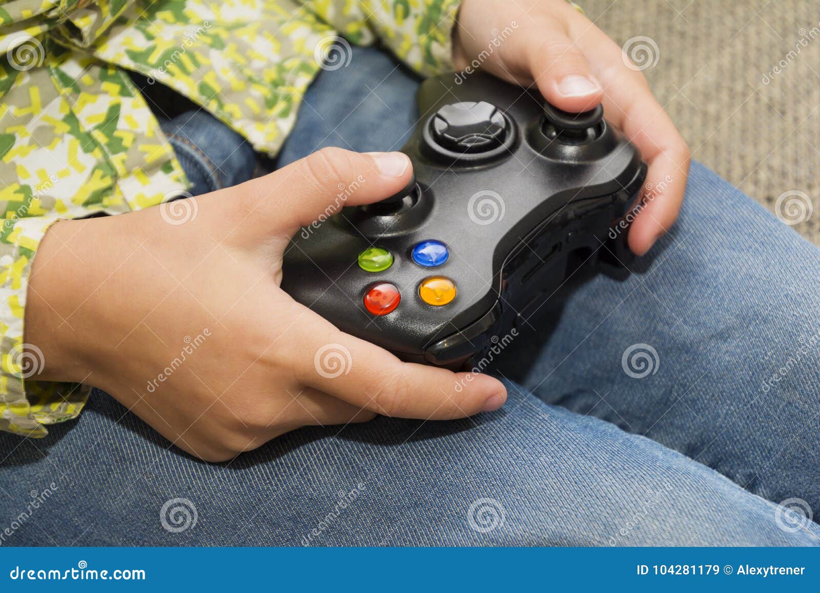 Hands Holding a Joystick Controller while Playing a Video Games Stock ...