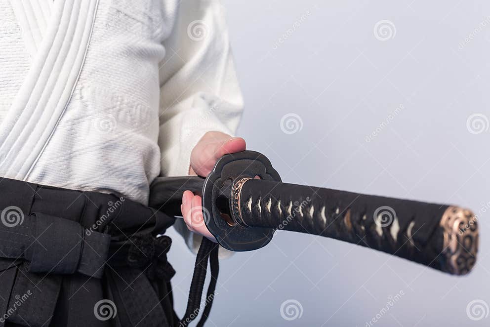 Hands holding the Katana stock image. Image of black - 86275589