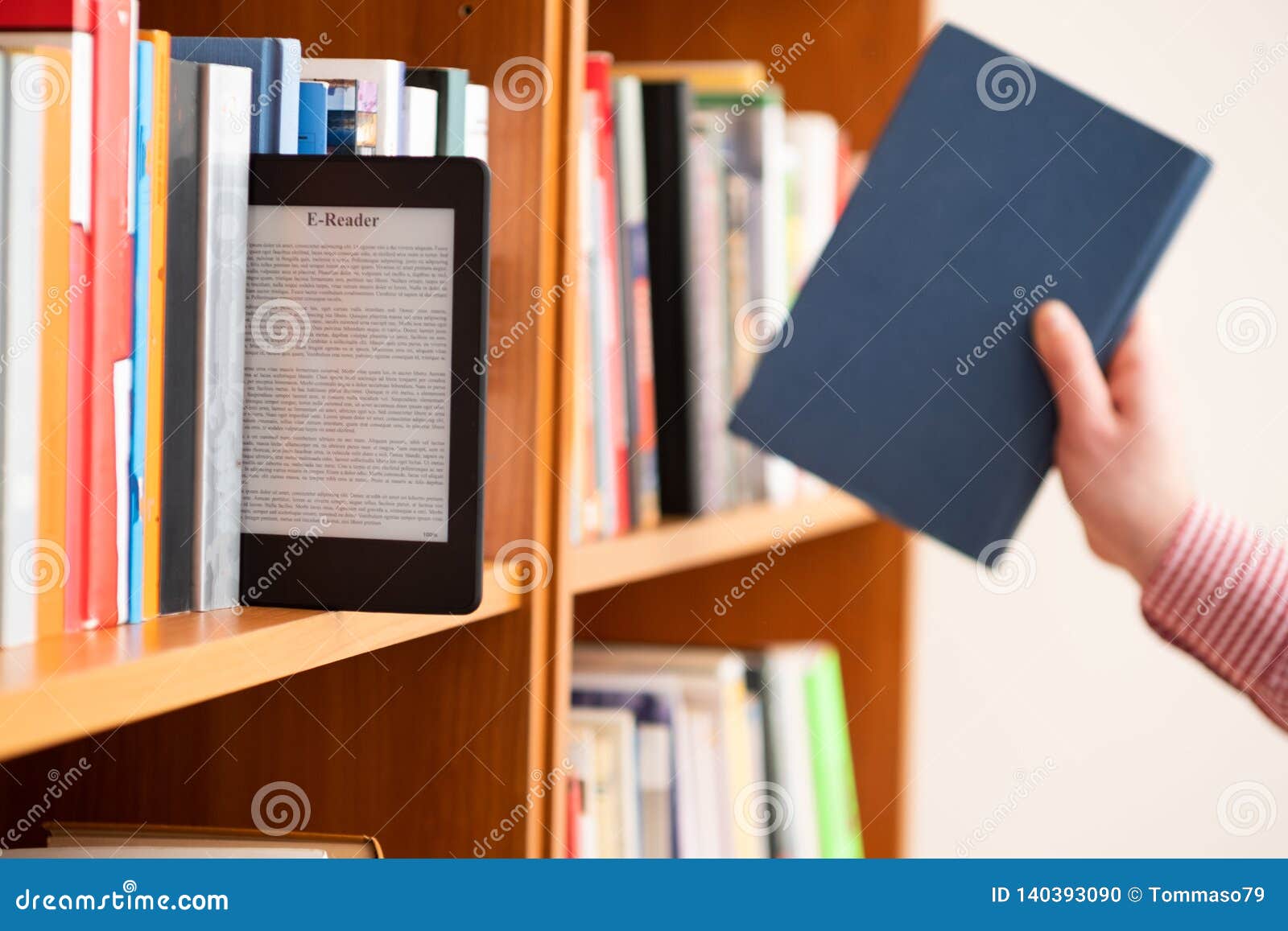 Hands Holding and Keeping Ebook on Bookshelf Background Stock Photo ...