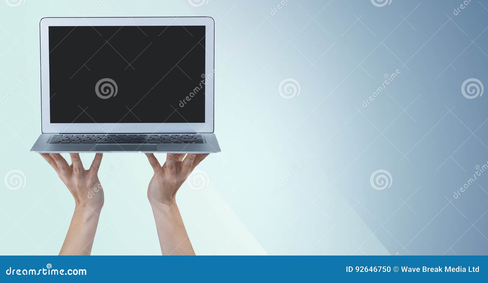 Hands Holding Laptop Against Blue Background Stock Photo - Image of ...