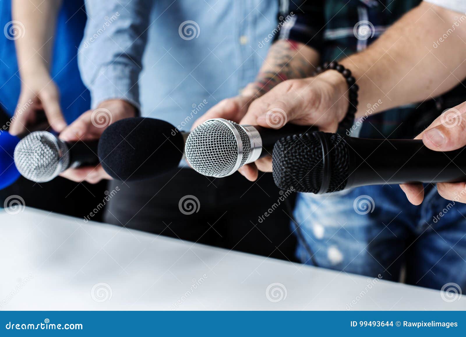 Hands Holding Microphone for an Interview Stock Photo - Image of ...