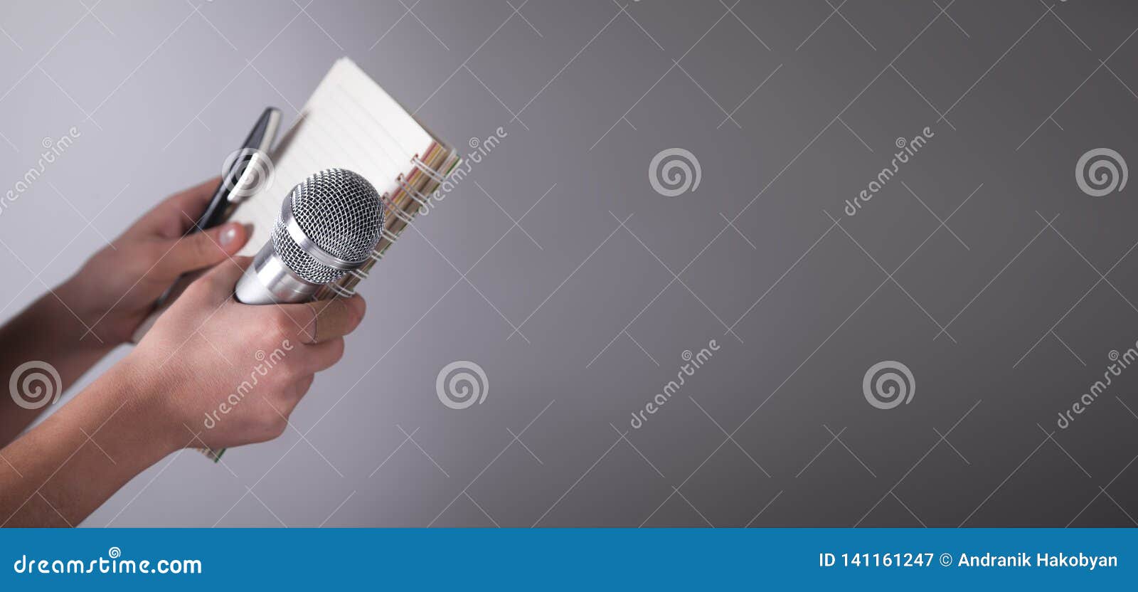 Hands Holding Microphone and Notepad Stock Image - Image of business ...