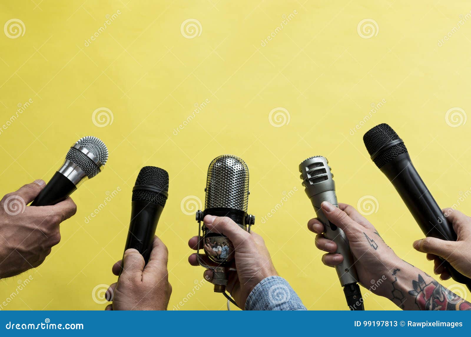 Hands Holding Microphone Point To the Same Direction Stock Image ...