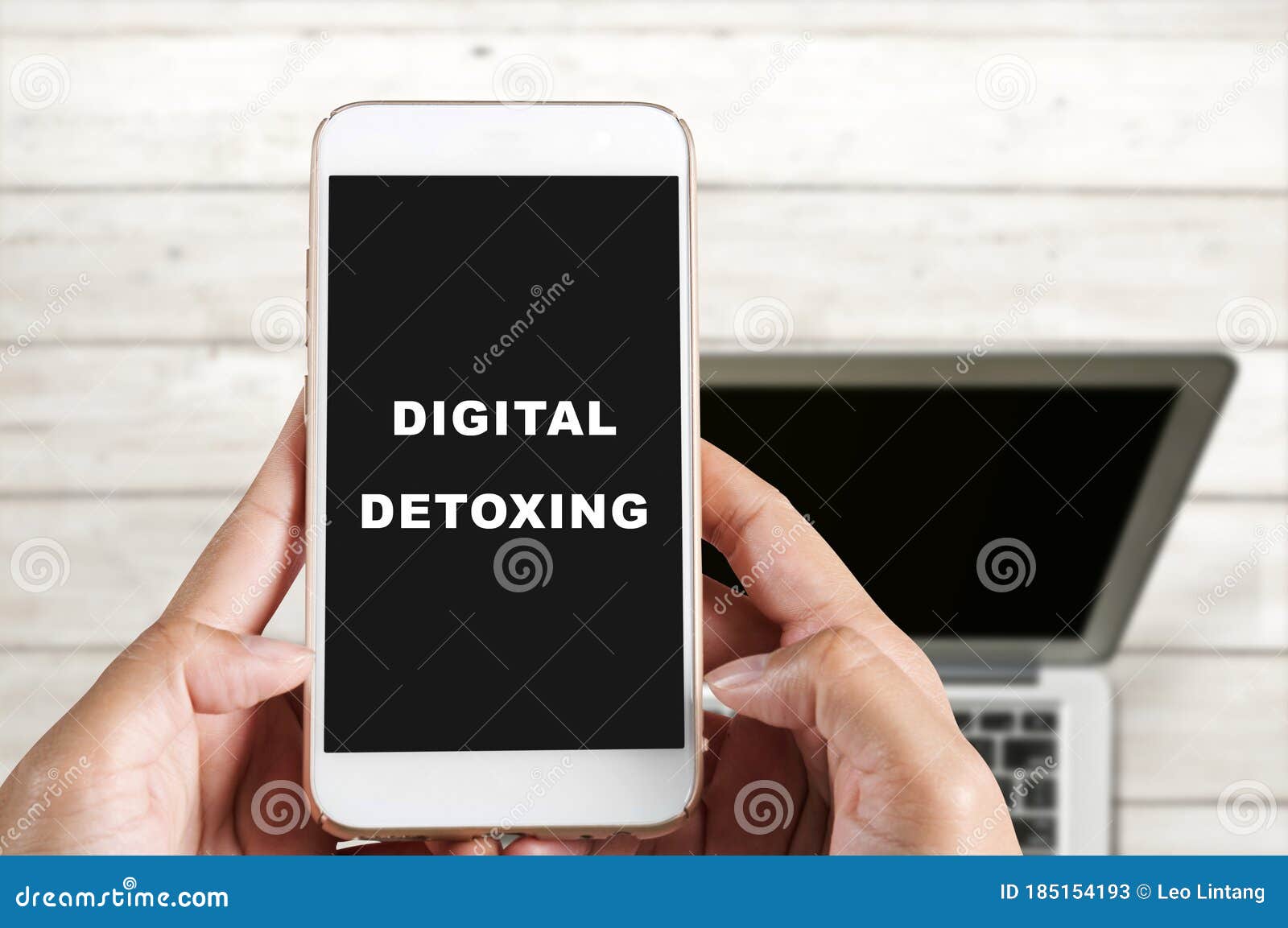 Hands Holding a Mobile Phone with Digital Detoxing Text on the Screen ...