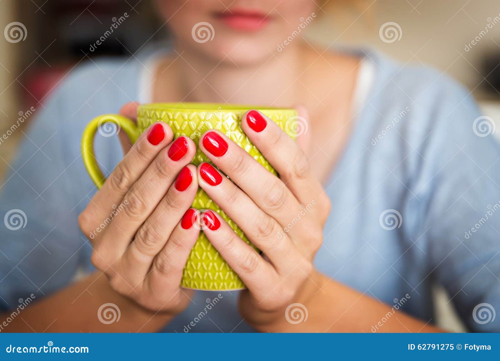 Hands holding mug stock image. Image of green, finger - 62791275