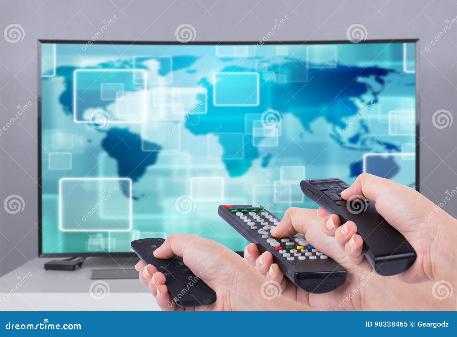 Hands Holding Multimedia Remote Control with Smart TV Stock Image ...